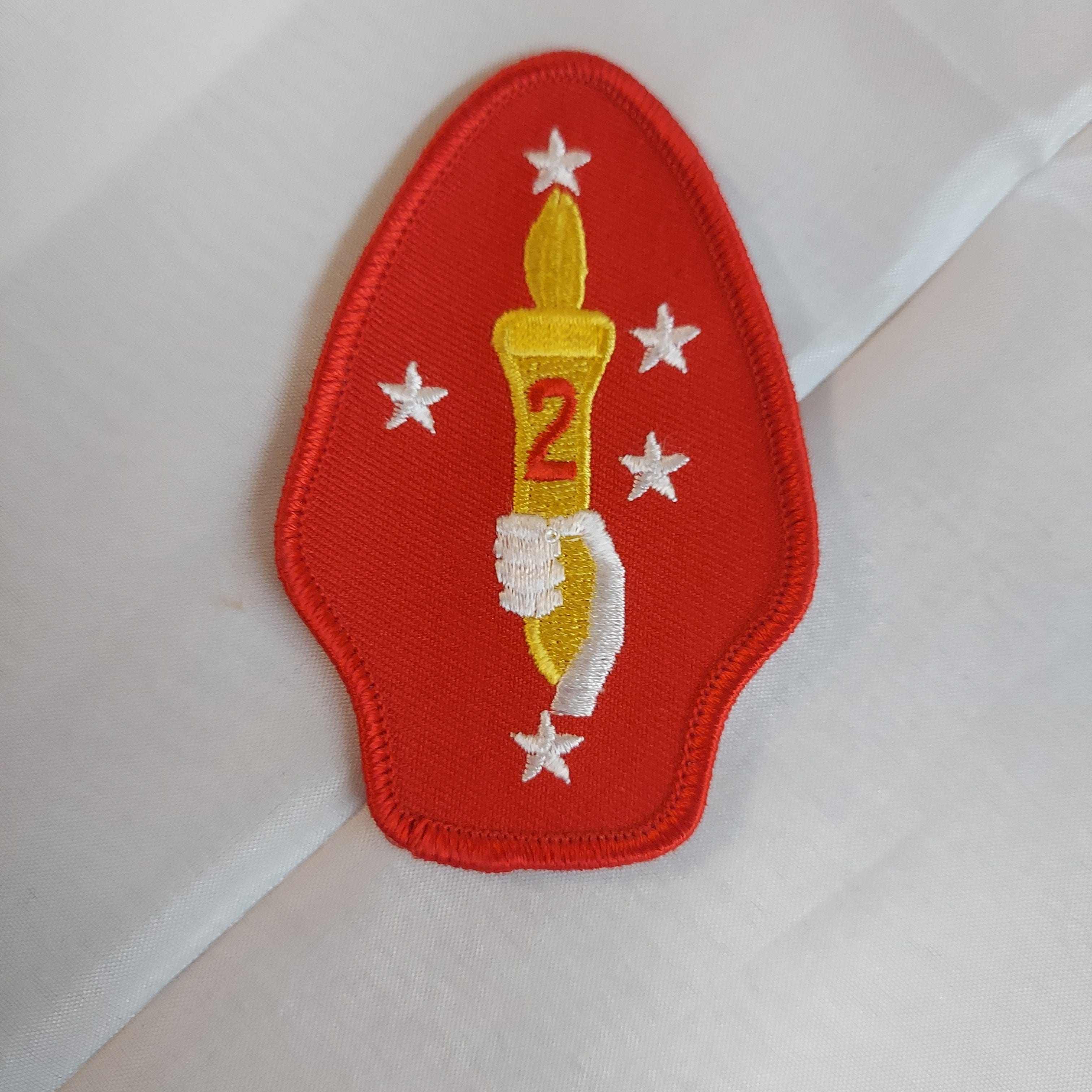 2nd Marine Division Patch The main background is vibrant red in the s ...